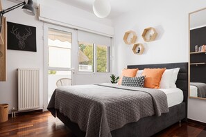 Apartamento luxo, vista para o jardim | Cofres nos quartos, cortinas blackout, quartos à prova de som