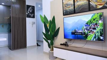 Apartamento superior, 2 quartos, sacada, vista para o jardim | Parte interna