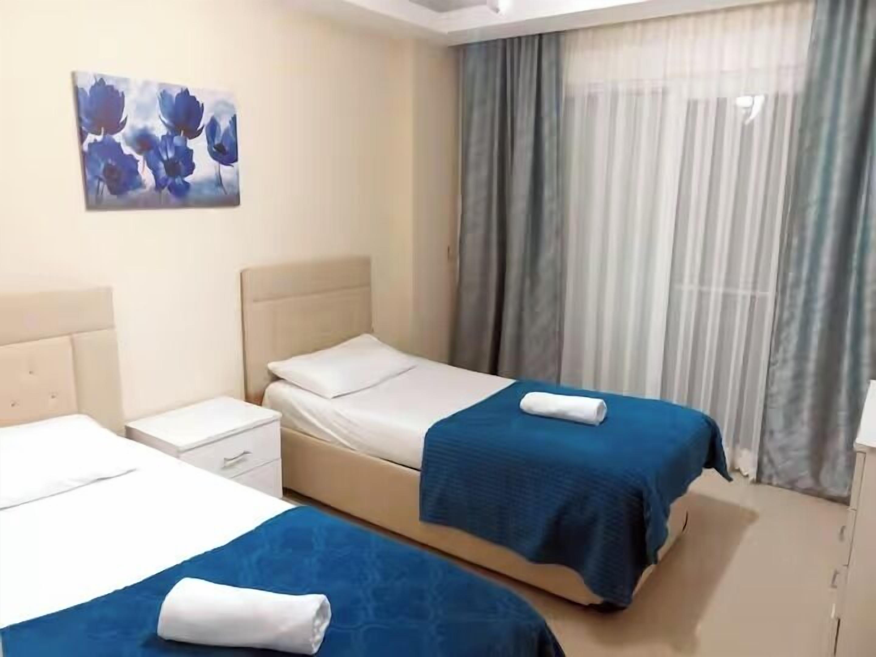 Two-Bedroom Villa | Cortinas/cortinados opacos, quartos insonorizados 