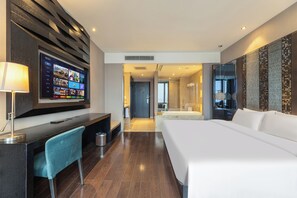 Quarto solteiro empresarial | Edredons de pluma, frigobar (abastecido com itens grátis)