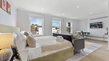 Apartamento superluxo, 1 quarto | Ferros/tábuas de passar roupa, Wi-Fi de cortesia, roupa de cama