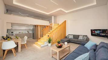 Suite, varanda, vista para o jardim | Sala de estar
