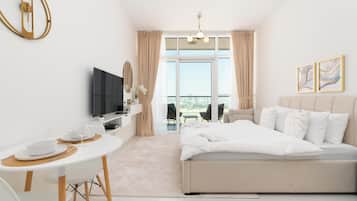 Estúdio Clássico, 1 cama queen-size, kitchenette, Vista para a cidade | Lençóis de algodão egípcio, roupa de alta qualidade, edredões de penas