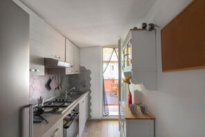 Apartamento luxo, sacada | Cozinha privada