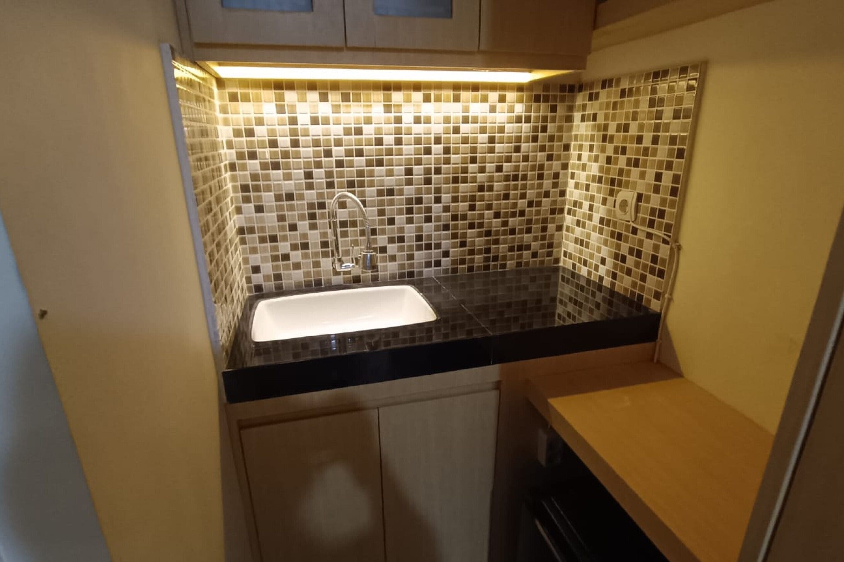 Quarto Duplo Deluxe | Casa de banho | Um polibã, toalhas fornecidas 