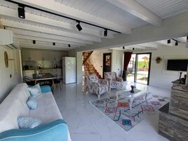 Vila luxo, vista para a piscina | Área de estar