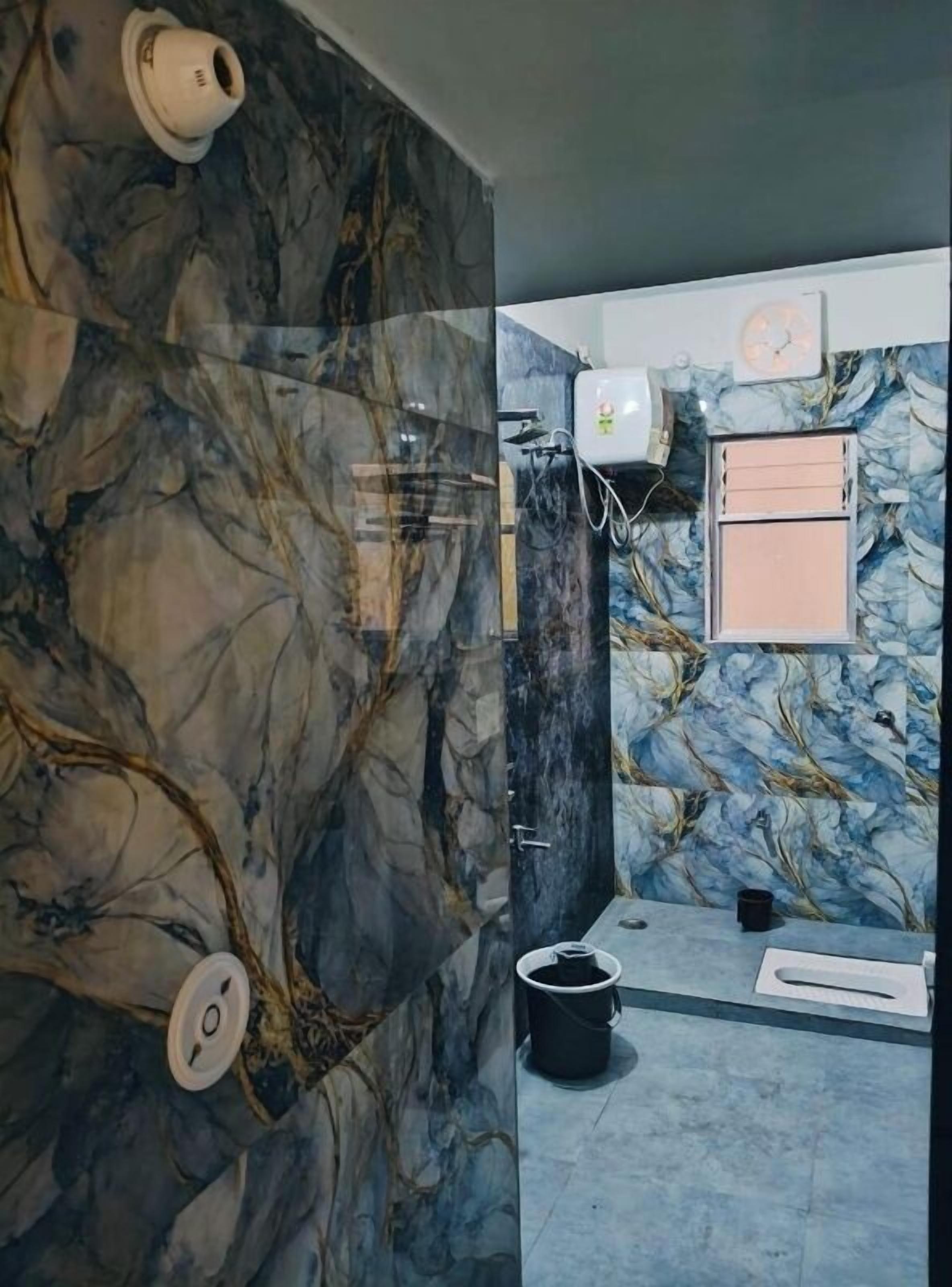 Quarto Deluxe, ar condicionado | Casa de banho | Artigos de higiene pessoal grátis, um secador de cabelo 