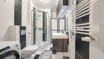 Apartamento (42) | Banheiro | Chuveiro, toalhas de banho