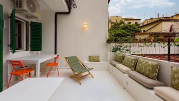 Apartamento conforto | Opções para refeição ao ar livre