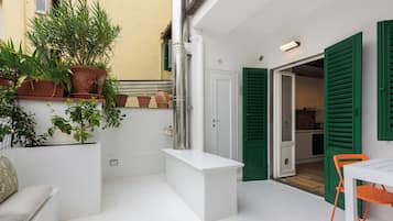 Apartamento conforto | Opções para refeição ao ar livre