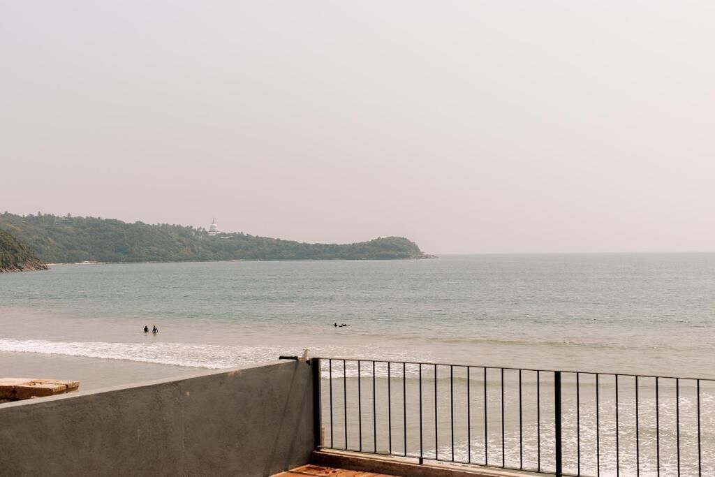 Quarto casal superior, sacada, vista para o oceano | Praia