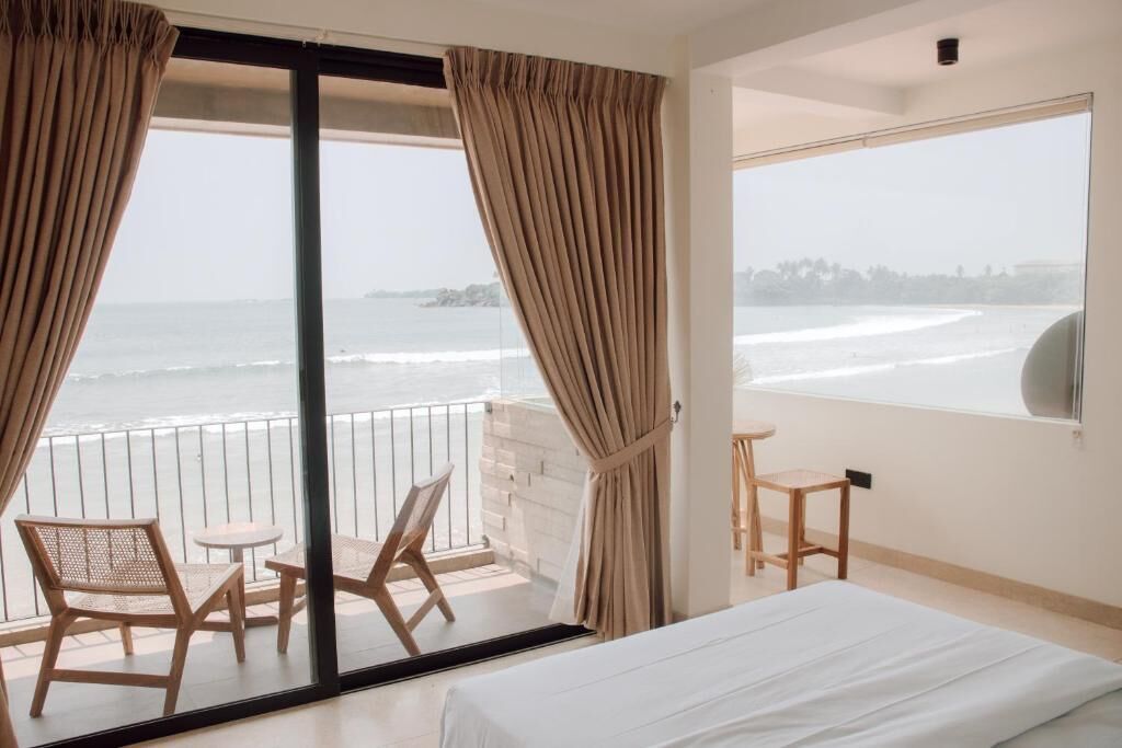 Quarto casal superior, sacada, vista para o oceano | Escrivaninha, espaço de trabalho para notebook, Wi-Fi de cortesia