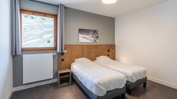 Apartamento | 2 quartos, roupa de cama