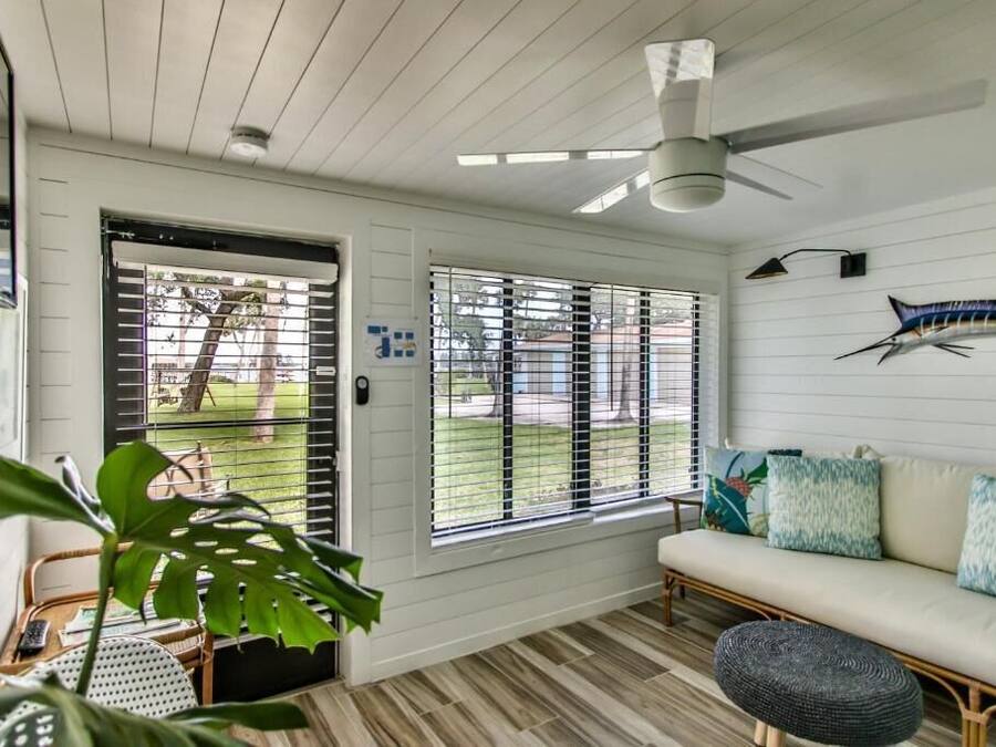 Suite Deluxe, vista para o rio | Sala de estar | Impressoras