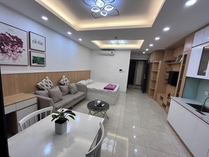 Apartamento Deluxe, varanda, Vista para a cidade | Sala de estar