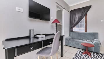 Apartamento, 1 quarto, pátio | Sala de estar