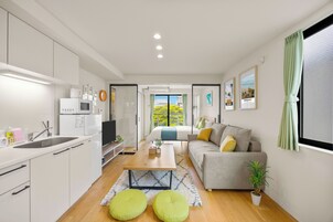 Apartamento standard, 1 cama de casal e sofá-cama, para não fumantes, de frente para a praia | Parte interna