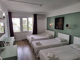 Quarto Quádruplo Clássico, varanda, Vista para a cidade | Wi-fi grátis