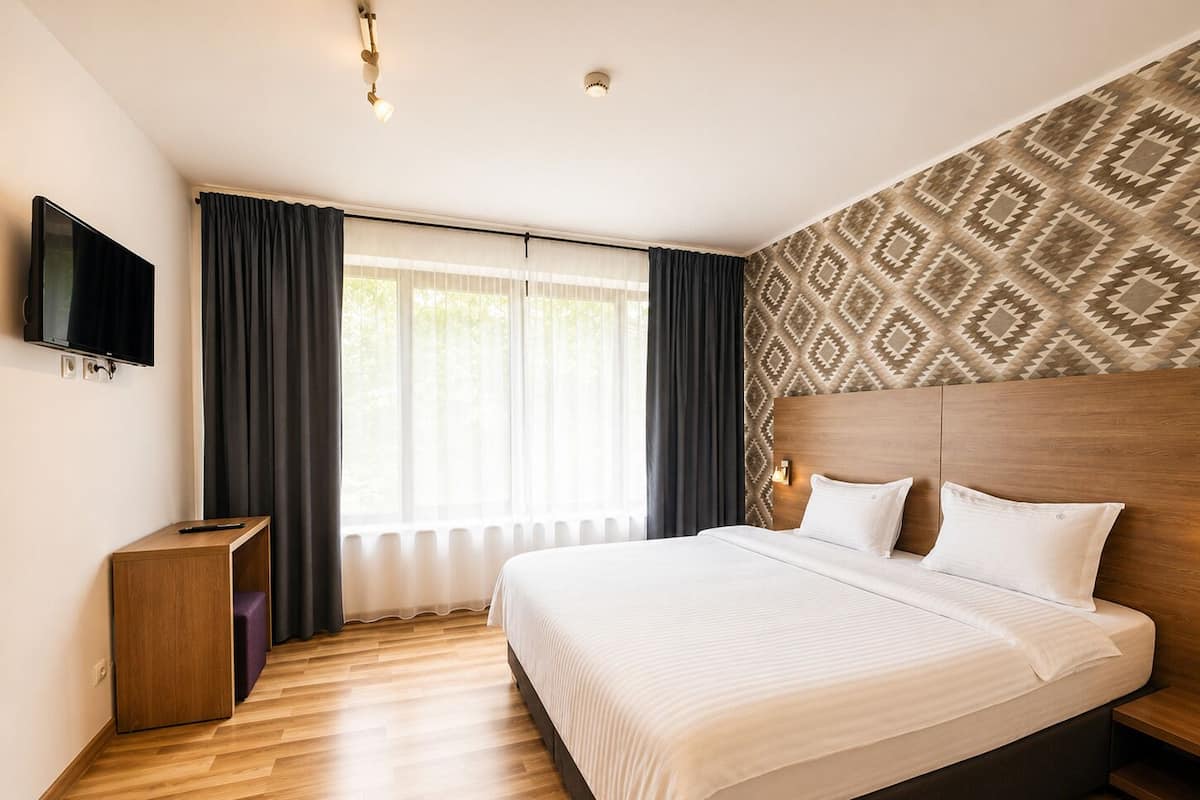 Quarto Duplo Premium, vista para o jardim | Interior
