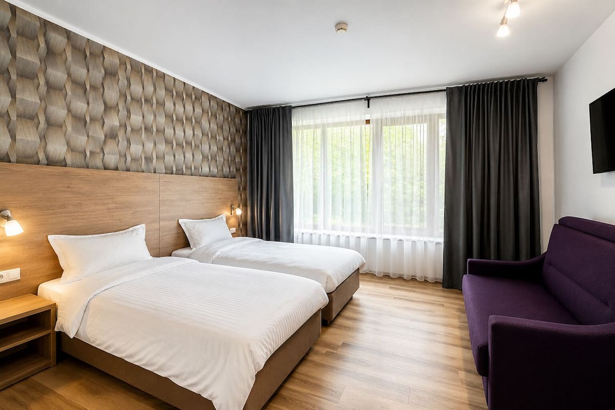 Quarto Duplo Superior, vista para o jardim | Wi-fi grátis, roupa de cama fornecida 