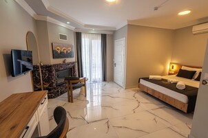 Quarto Deluxe, varanda, vista para o jardim | Interior
