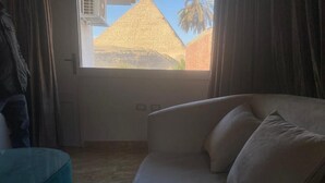 Quarto Duplo Deluxe, vista para a montanha | Sala de estar