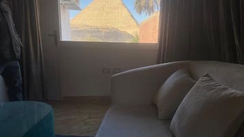 Quarto Duplo Deluxe, vista para a montanha | Sala de estar