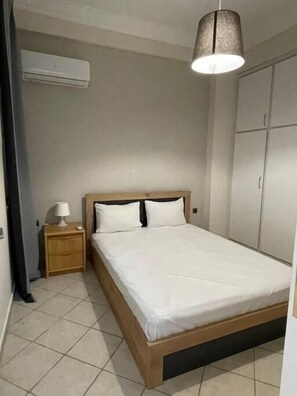 Apartamento, varanda | Ferro/tábua de engomar, Wi-fi grátis 