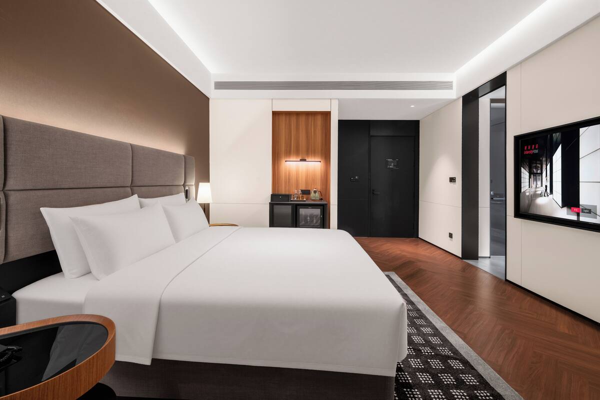 Roupas de cama premium, frigobar (abastecido com itens grátis)