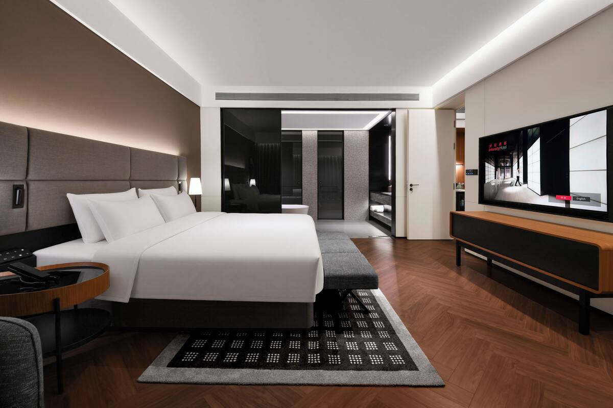 Suíte executiva, vista para o mar | Roupas de cama premium, frigobar (abastecido com itens grátis)