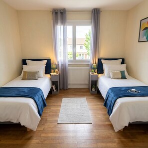 Apartamento família, 3 quartos, para não fumantes, aceita animais de estimação | Roupas de cama premium, cortinas blackout, ferros/tábuas de passar roupa