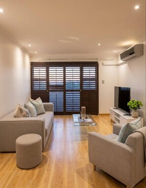 Apartamento, 2 quartos, para fumantes, sacada | Sala de estar