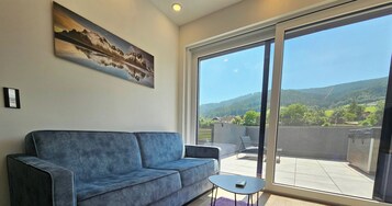 Apartamento, vista para a montanha | Sala de estar