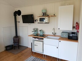 Cabine, 1 quarto, varanda, vista para o jardim | Cozinha privada
