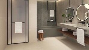 Apartamento Deluxe, 2 quartos | Casa de banho | Chinelos, toalhas fornecidas 