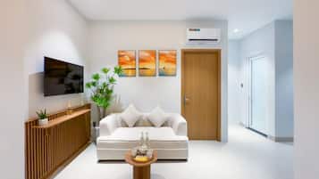 Apartamento standard, 2 quartos, cozinha | Área de estar