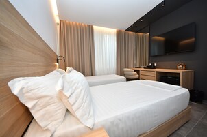 Quarto Twin Deluxe, Vista para a cidade | Secretária, secretária adequada para computadores portáteis