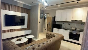 Apartamento, 1 quarto | Sala de estar