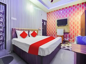 Quarto casal luxo, vista para a cidade | Área de estar