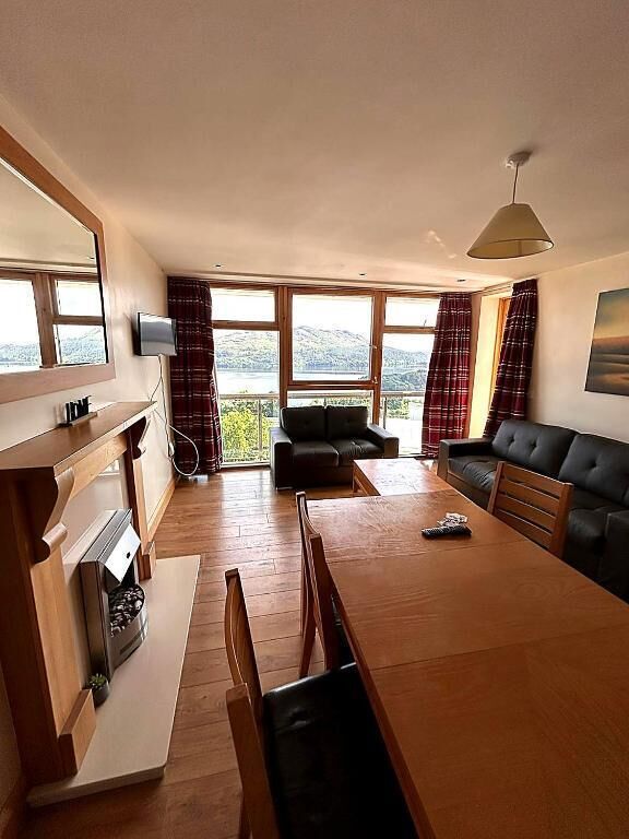 Apartamento Comfort, varanda, vista para o lago | Sala de estar