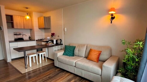 Apartamento superior, vista para o jardim | Área de estar