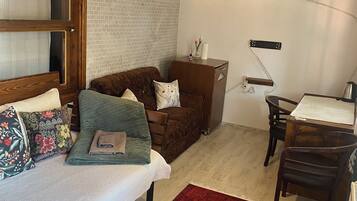 Suite Familiar, varanda, vista para o jardim | Sala de estar