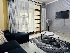 Apartamento, 2 quartos, acessível, fumadores | Sala de estar