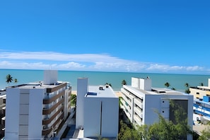 Estúdio básico, vista parcial para o mar | Fachada