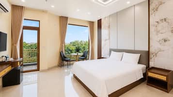 Quarto casal superior | Escrivaninha, Wi-Fi de cortesia, roupa de cama