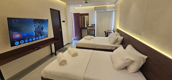 Quarto Triplo Deluxe | Secretária, quartos insonorizados, ferro/tábua de engomar, Wi-fi grátis 