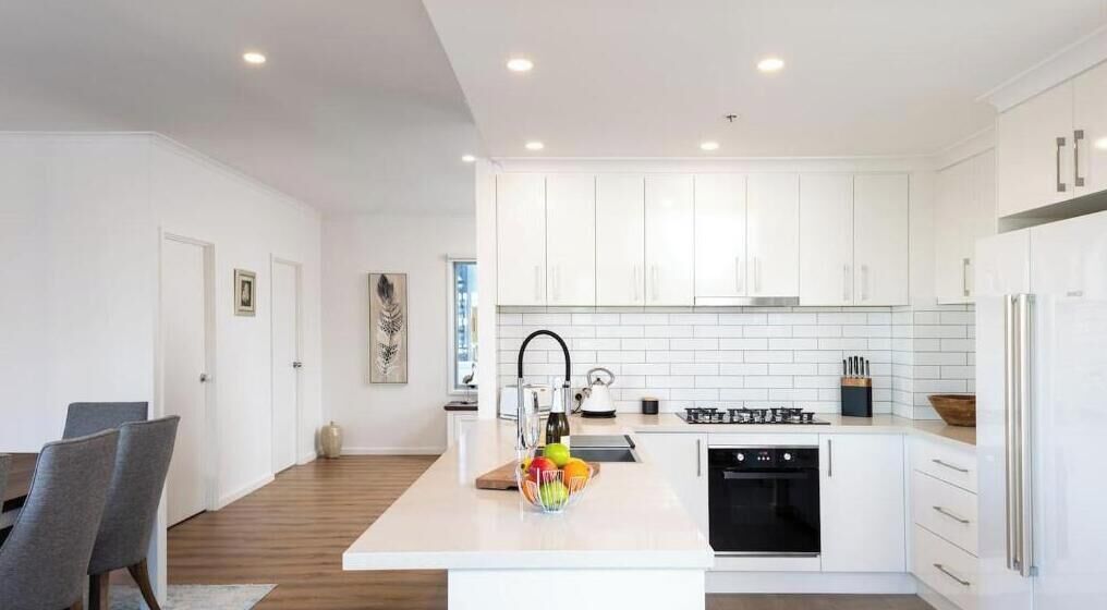 Apartamento luxo, sacada, vista para a cidade | Cozinha privada