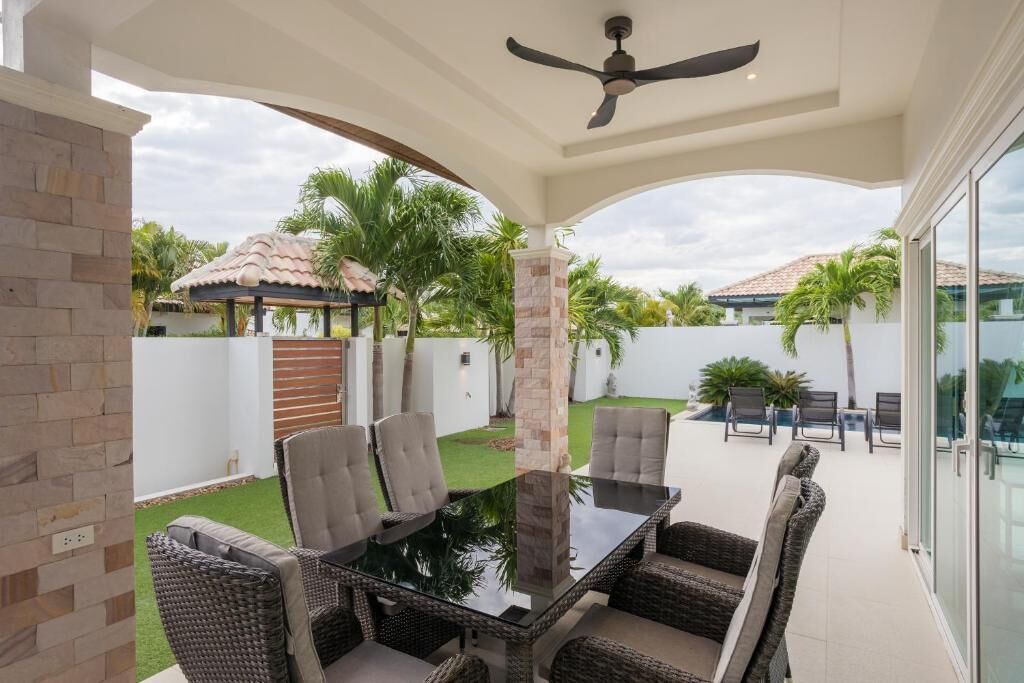 Villa, vista para o jardim | Refeições ao ar livre