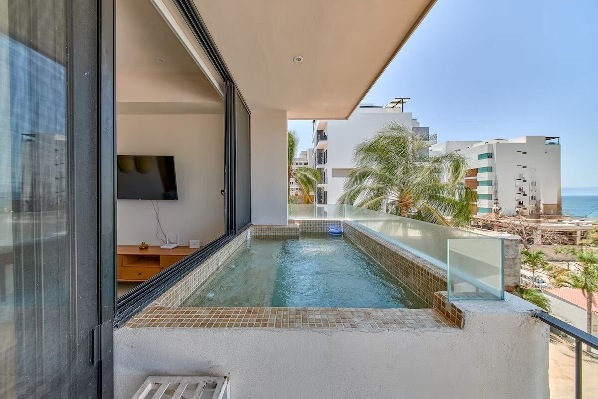 Apartamento Comfort em Condomínio Fechado, 1 cama king-size e sofá-cama, varanda, vista para a praia | Terrenos do alojamento