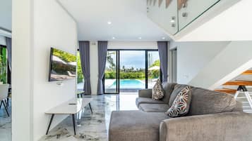 Vila superluxo | Área de estar | Smart TV 50 polegadas com canais digitais